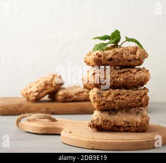 baked Krakow meringue cookies on a wooden board, delicious dessert of ...
