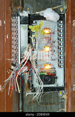 Badly damaged interphone and CCTV camera system Stock Photo - Alamy