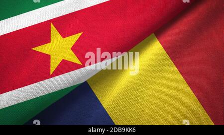 Chad and Suriname two flags textile cloth, fabric texture Stock Photo ...