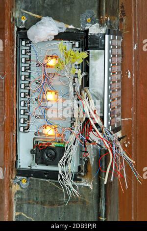 Badly damaged interphone and CCTV camera system Stock Photo - Alamy