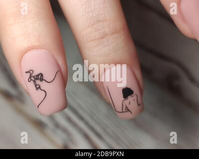 Beautiful woman's nails with beautiful christmas manicure studio Stock ...