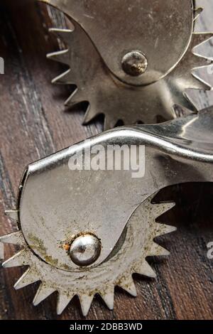 Roulette marks tailor patterns with rust and close up Stock Photo - Alamy