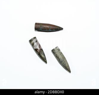 scratched ammunition for AK-47 on a white background Stock Photo - Alamy