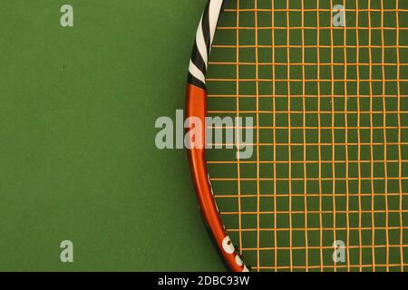 Tennis Racket on Green Playground Court. Sport Background Stock Photo ...