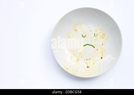 Dirty dish unhappy face on white background. Top view, Copy space Stock ...