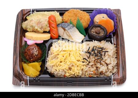 Plastic lunch box with tasty bento cake for Valentine's Day on red background Stock Photo - Alamy