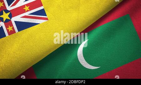 Maldives and Niue two flags textile cloth, fabric texture Stock Photo ...