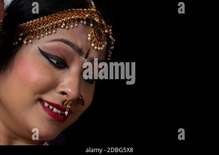 Kuchipudi dancer showing Karuna rasa in her performance Stock Photo - Alamy