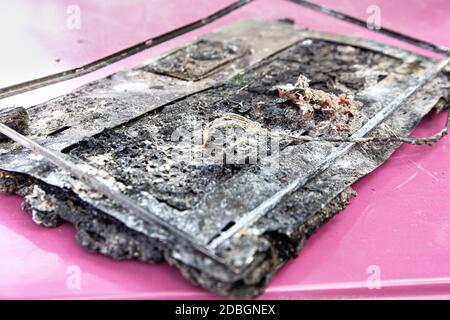 Computer Fire. Broken laptop computer spoiled by flame of hot fire ...