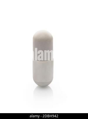 One pill on white background. Medicinal treatment Stock Photo - Alamy