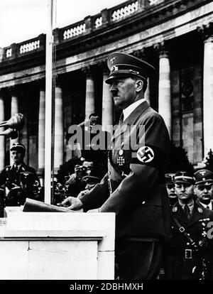 Adolf Hitler announces the annexation of Austria to the German Reich on ...