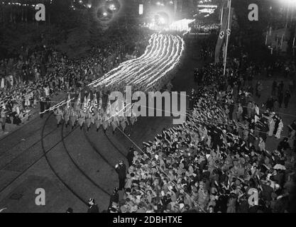 View of the torchlight procession of the political organizations of the ...
