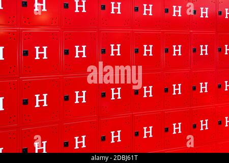 Perspective shot of red fire hydrant lockers Stock Photo - Alamy