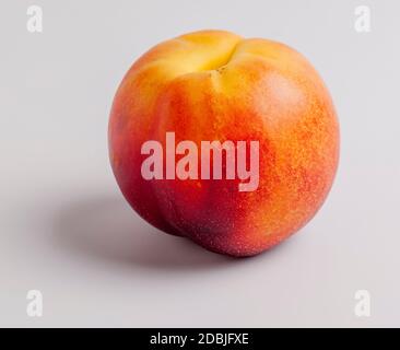 Single Nectarine on White Background Stock Photo - Alamy