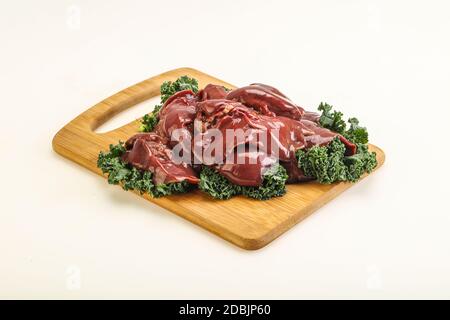 Raw chicken liver over board for cooking Stock Photo - Alamy