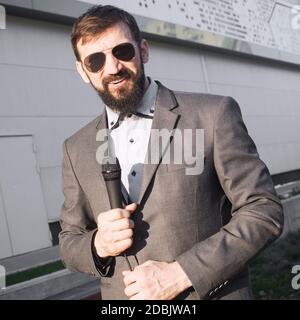 Newscaster talking about daily news live on television, broadcasting ...