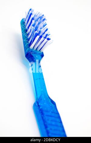 Blue toothbrush isolated on a white background Stock Photo - Alamy