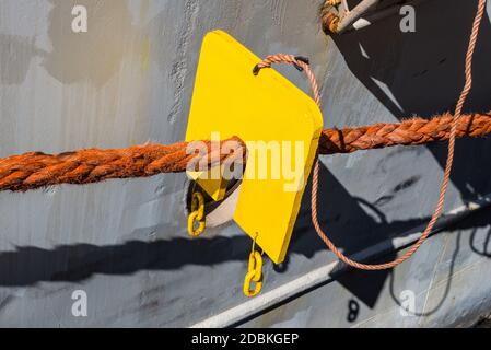 Rat guards on ship mooring ropes to prevent Rats getting aboard Stock ...