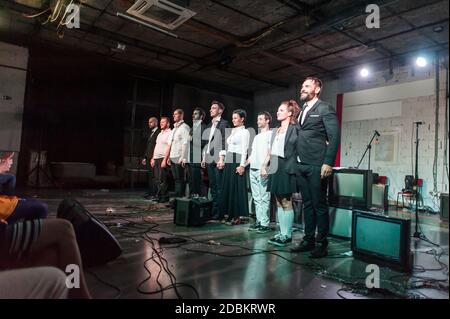 Professional actors bowing on stage in theatre, back view Stock Photo ...