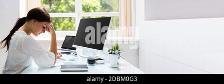 Bad Posture While Using Computer. Stressed Employee Stock Photo - Alamy