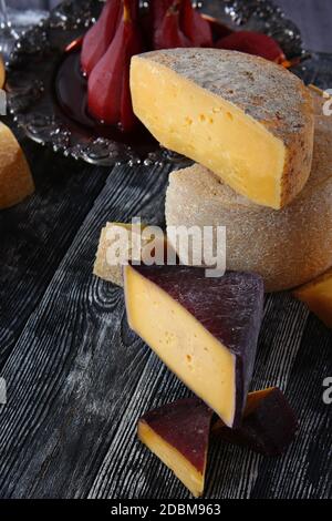 Cheese heads cut in half on wooden background. Macro photo interior ...