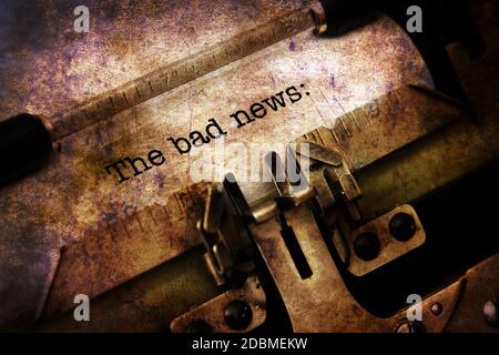 Bad news on typewriter grunge concept Stock Photo - Alamy
