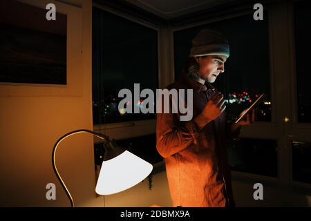 Scrolling on a computer in the dark Stock Photo - Alamy