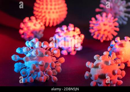 picture of some colorful illuminated symbolic viruses in dark back ...
