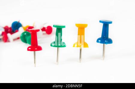 colorful push pins over white Stock Photo - Alamy
