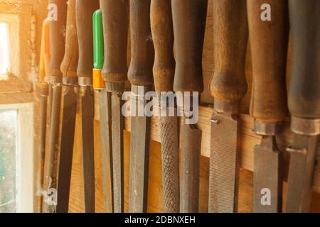 Several old dusty files hang in a row Stock Photo - Alamy