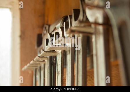 Old rusty spanners are hanging in a row in the shed Stock Photo - Alamy
