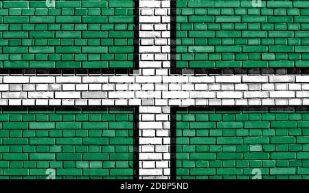 Flag of Devon painted on brick wall Stock Photo - Alamy