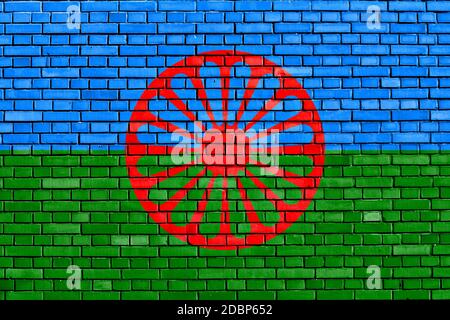 Flag of Romani people painted on brick wall Stock Photo - Alamy