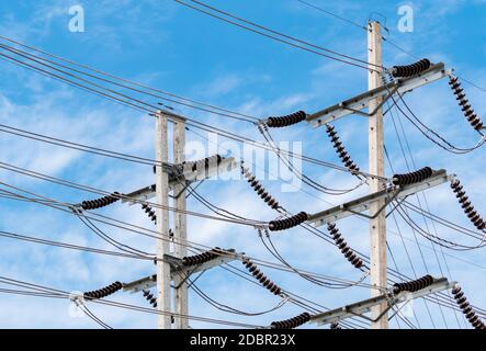 Closeup of a concrete electric pole with three phases Stock Photo - Alamy