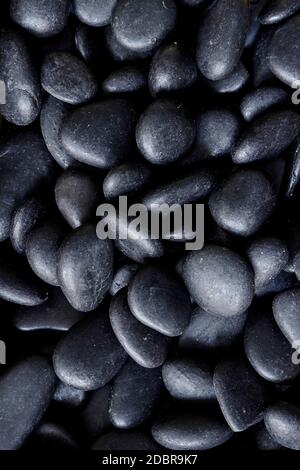 A studio photo of black river rocks Stock Photo - Alamy