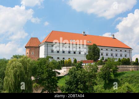 Sandomierz, Poland. Medieval gothic castle in front, old town with town ...