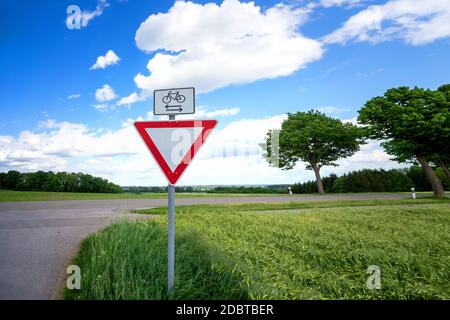 German road sign: stop and give way Stock Photo - Alamy