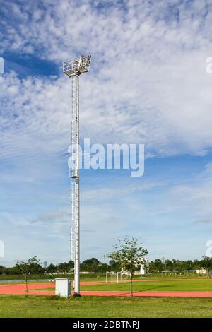 The Stadium Spot-light tower over Blue Sky Stock Photo - Alamy