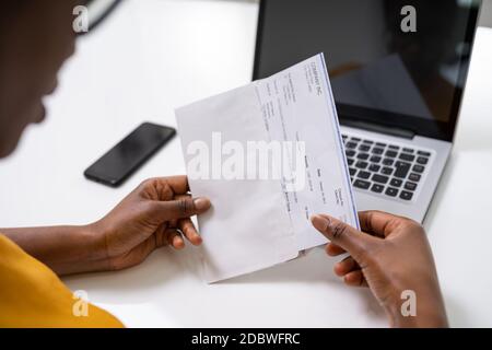 African American Women Holding Payroll Cheque Or Money Check Stock ...