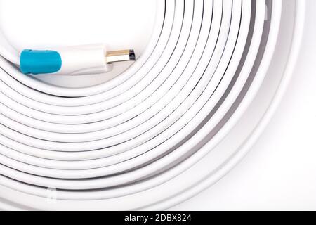 Wrapped role with white HDMI cable in Detail Stock Photo - Alamy