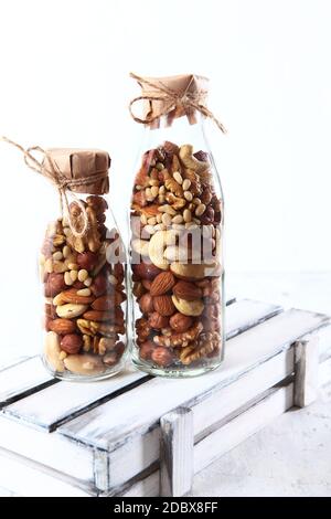 set of hazelnuts on vintage wooden board food and drink concept Stock ...