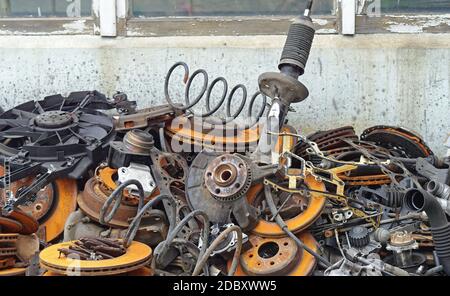 Old car parts scrap metal for recycling Stock Photo - Alamy