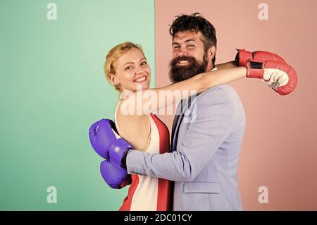 Family life. Boxers fighting gloves. Difficult relationships. Couple in ...