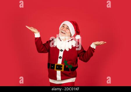 Sincere congratulations. bearded santa in hat on red background. xmas ...