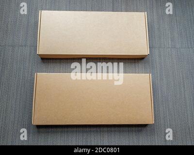 Two Long Cardboard Boxes Packages Closed Stock Photo - Alamy