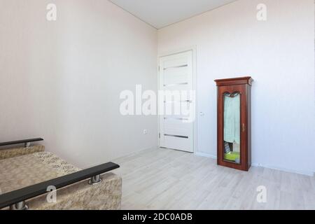 The interior of a modest small bedroom with very poor furniture Stock ...