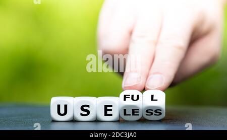 Useful or useless symbol. Concept words Useful or Useless on wooden ...