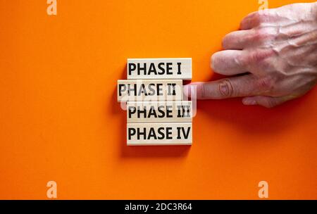 Wooden blocks with words 'vaccine trial' and stethoscope on black ...