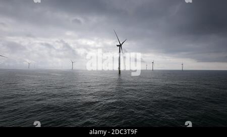 Dramatic black and white picture of offshore wind farm in north sea ...