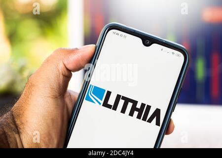 In this photo illustration, the Lithia Motors logo is seen displayed on ...